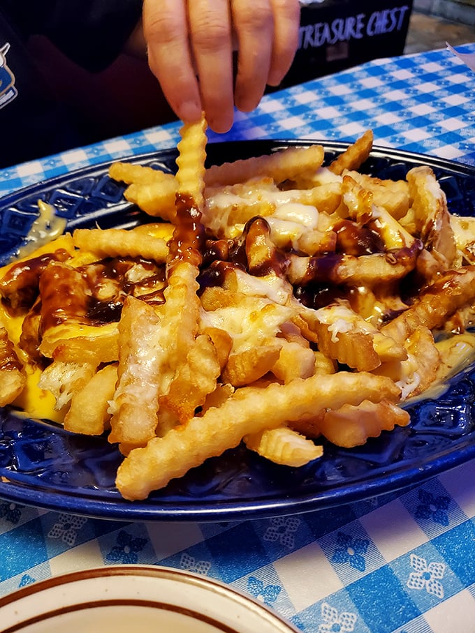 Poutine fries that could make a Canadian weep with joy. Cheese, gravy, and perfectly crisp potatoes – the holy trinity of indulgence.