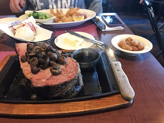 Prime rib so perfectly pink it should be on a Valentine's card, topped with mushrooms that found their true purpose in life.