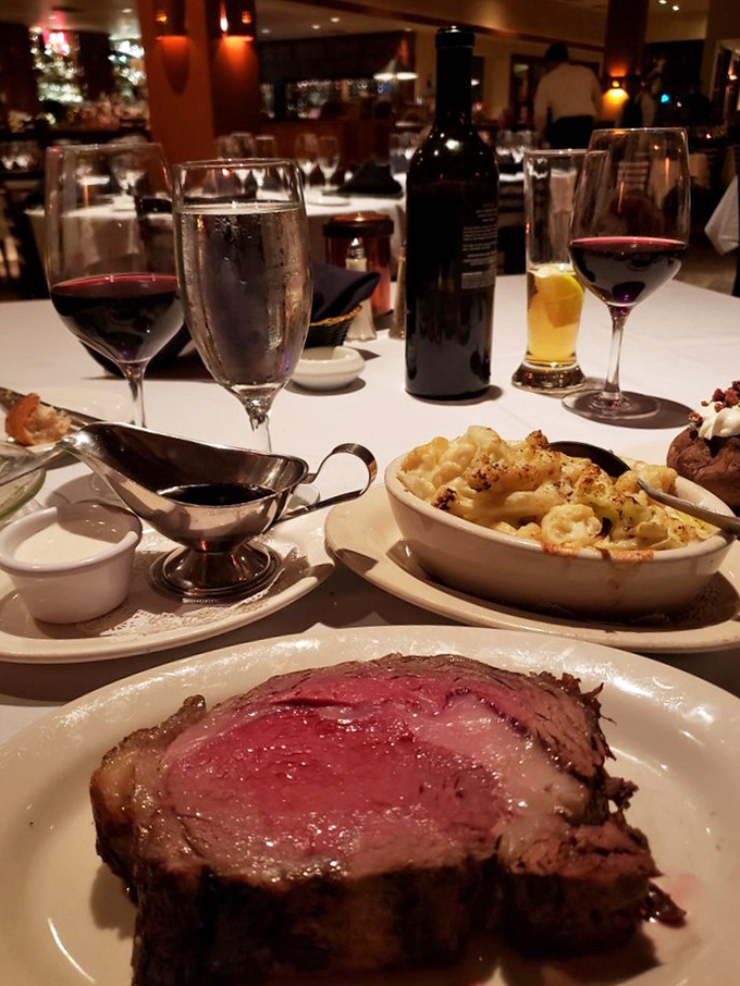 Prime rib so perfect it practically glows, served with sides that understand they're witnessing greatness on a plate.