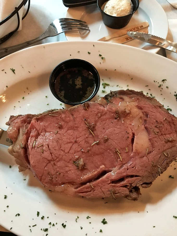 Prime rib so perfectly pink it makes vegetarians question their life choices, served with a side of au jus that deserves its own fan club.