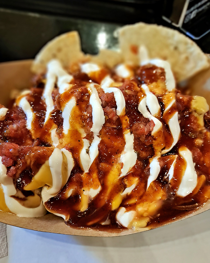 When nachos meet barbecue, it's like the Avengers of comfort food assembling on one glorious plate.