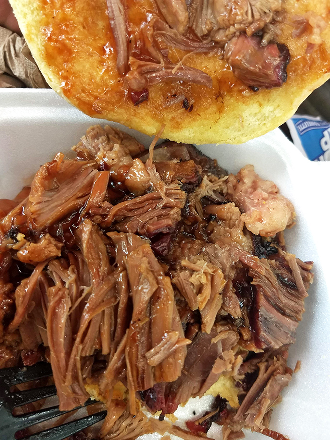 Pulled pork that's had a proper introduction to smoke and time. Each strand tells a story of patience rewarded.