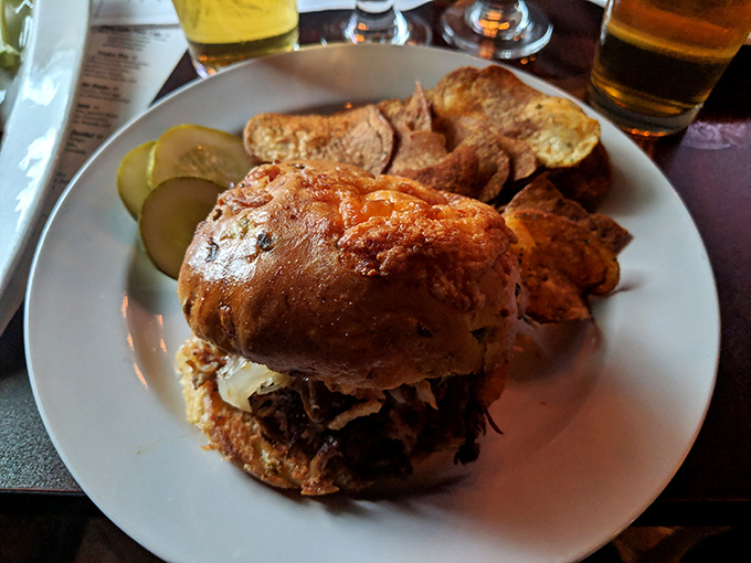 This pulled pork sandwich isn't messing around&mdash;serious comfort food with house-made chips that'll make you question store-bought forever.