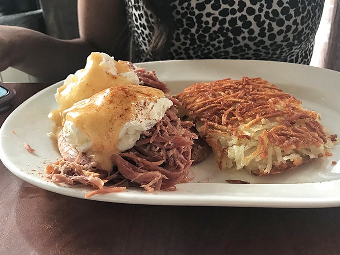 This isn't just breakfast&mdash;it's architecture. Layers of savory goodness crowned with hollandaise and paired with crispy hash browns. Breakfast royalty.