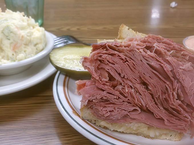 The money shot: toasty bread embracing a generous heart of pink meat and melted cheese. This sandwich doesn't need a filter to look good.