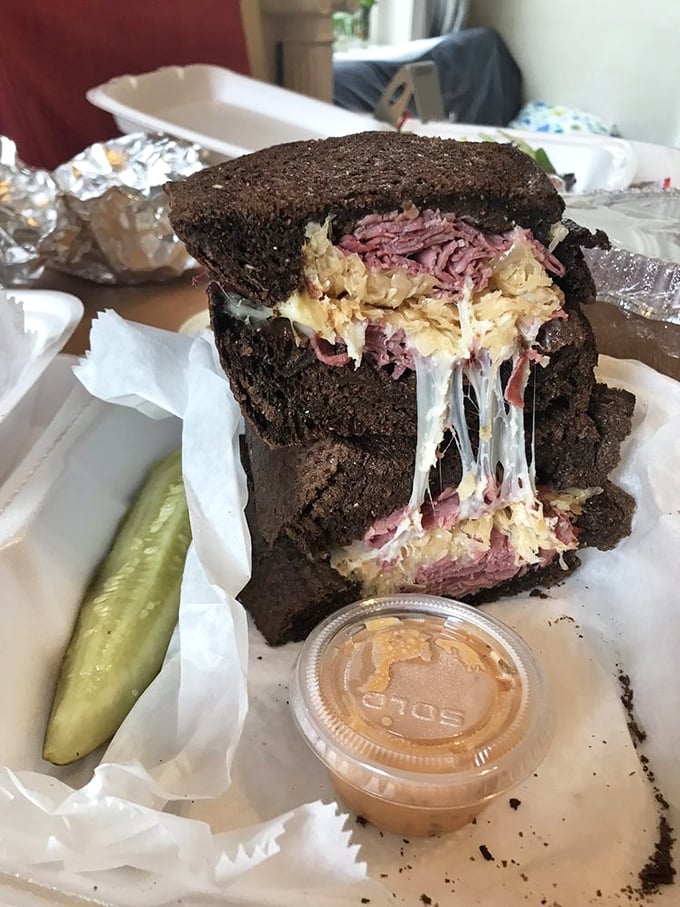 The Reuben at Big Jim's doesn't just stack corned beef&mdash;it creates a skyscraper of flavor between dark rye foundations. Melty, messy perfection.
