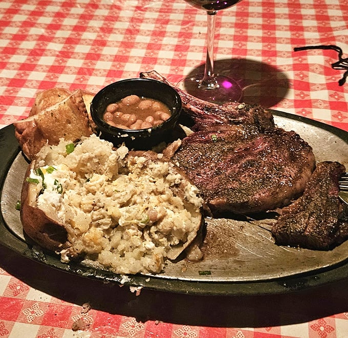 A steak so perfectly cooked it deserves its own ZIP code, accompanied by a loaded potato that's having its own moment.