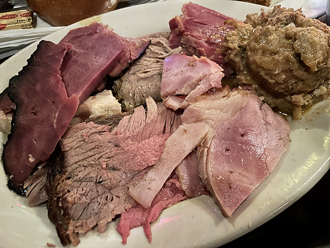 The roast beef sandwich: pink in the middle, piled high, and proof that sometimes the simplest pleasures are the most profound.