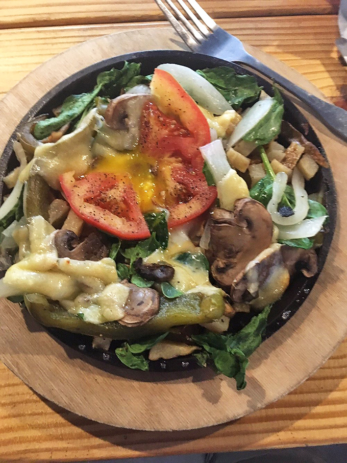 Even the salads here mean business, with fresh greens, saut&eacute;ed mushrooms, and melted cheese creating a dish that makes eating vegetables feel like cheating.