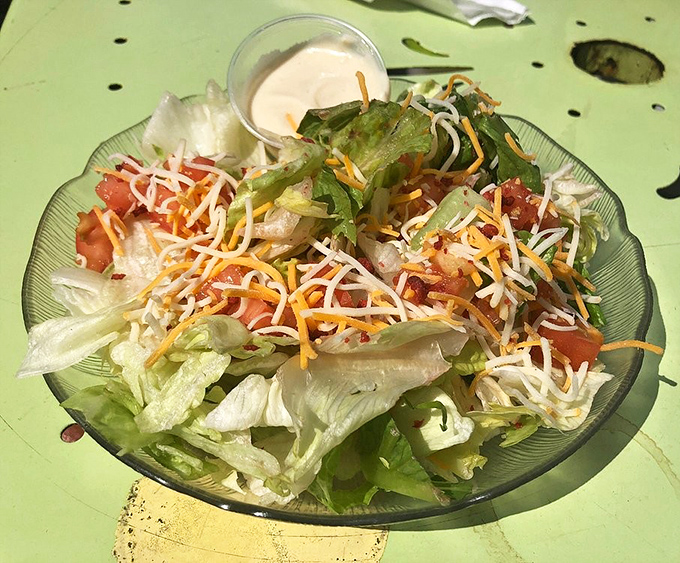 A fresh garden salad provides the perfect counterpoint to all that glorious fried goodness. Even vegetables deserve their moment in the spotlight. 