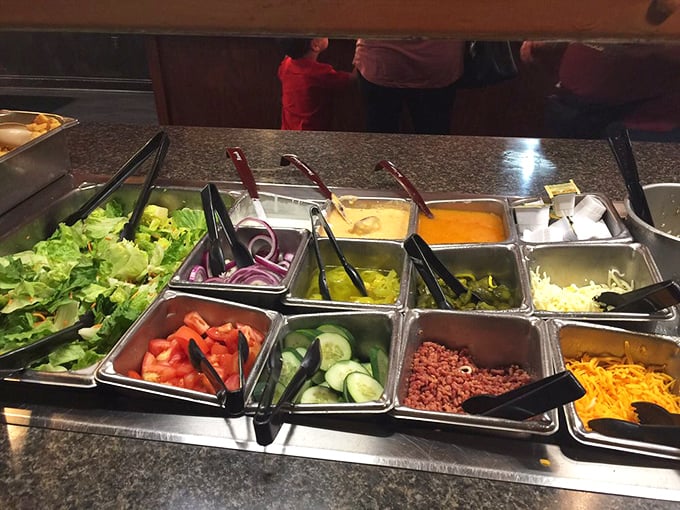 The salad bar: where we pretend we're being virtuous before returning for our fourth plate of crab legs.