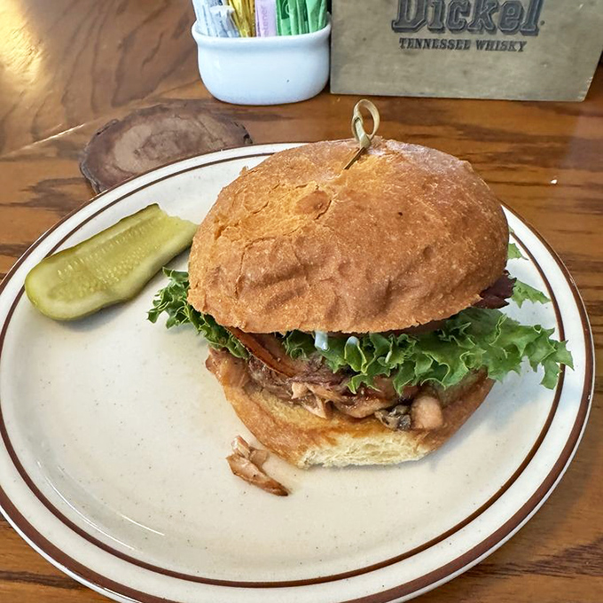 This isn't your average sandwich – it's architectural genius. Layers of salmon, bacon, and fresh vegetables create a BLT masterpiece that requires both hands and several napkins.