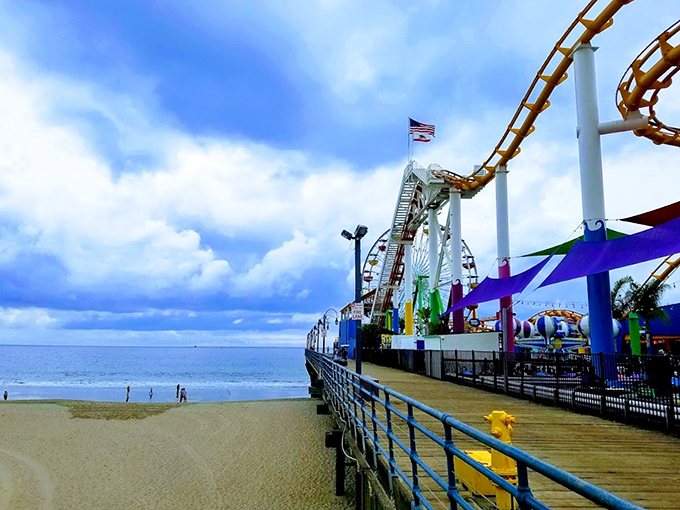 Where roller coaster tracks frame ocean horizons, reminding thrill-seekers that sometimes the best views come with a side of adrenaline.