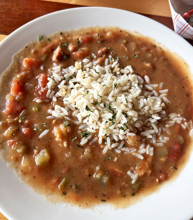 A proper seafood gumbo should tell a story in every spoonful. This one's writing a novel with chunks of seafood and that perfect roux-based broth.
