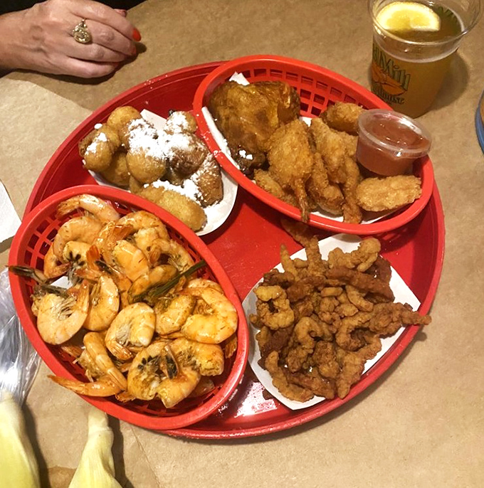 This seafood platter isn't just a meal&mdash;it's a maritime festival where shrimp, hush puppies, and fried delights compete for your attention.