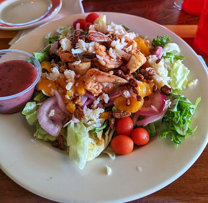 A seafood salad that makes eating greens feel like cheating. Those mandarin oranges and pecans are playing supporting roles worthy of Oscars.