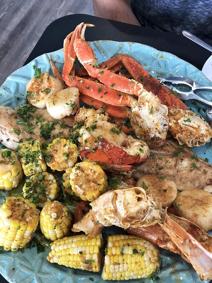 This seafood platter isn't just a meal&mdash;it's a maritime celebration where crab legs, corn, scallops, and shrimp throw the party of the year.