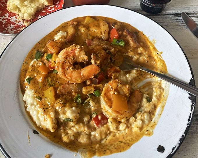 Shrimp and grits so creamy and rich they could finance your retirement. Plump shrimp swimming in a sea of southern comfort.