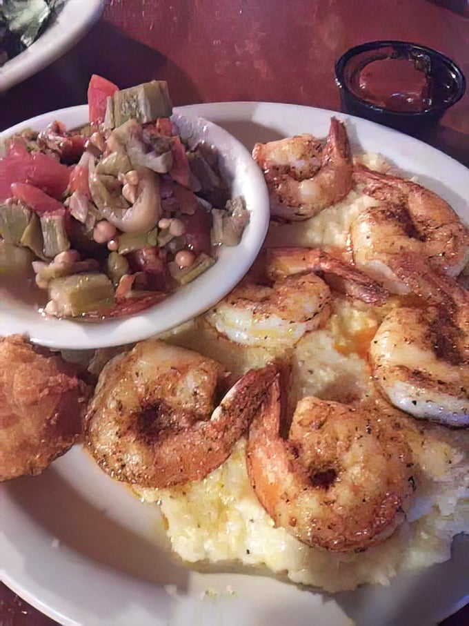 Plump, perfectly seasoned shrimp nestled on a cloud of creamy grits&mdash;Southern comfort that makes you want to hug your plate.