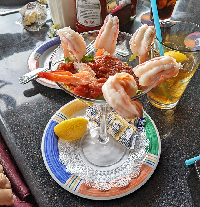 The shrimp cocktail that launched a thousand return visits&mdash;plump crustaceans perched on a martini glass like they're auditioning for a seafood calendar.