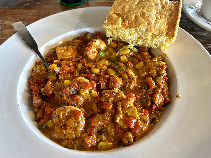 Shrimp and grits elevated to an art form, with a side of cornbread that deserves its own fan club.