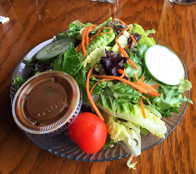 Even the side salad gets the star treatment&mdash;crisp, colorful, and fresh enough to make you momentarily forget you came for seafood.