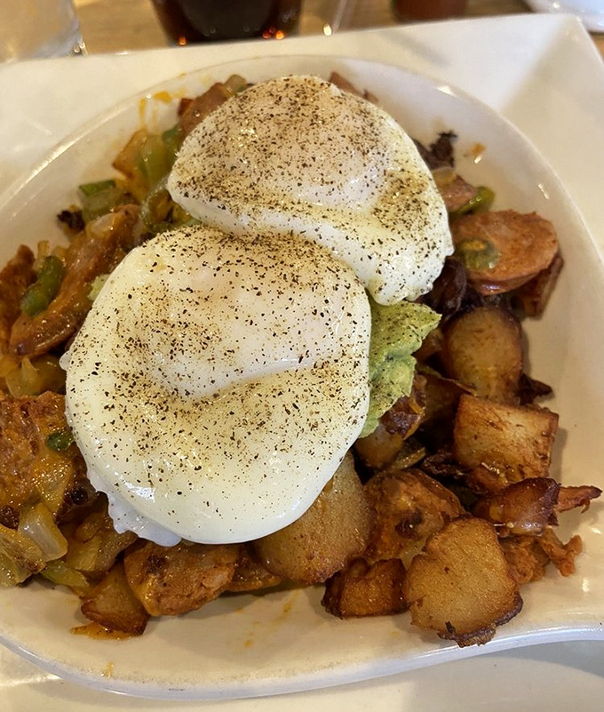 A skillet that's essentially a breakfast treasure hunt. Those perfectly poached eggs are the X marking the spot.