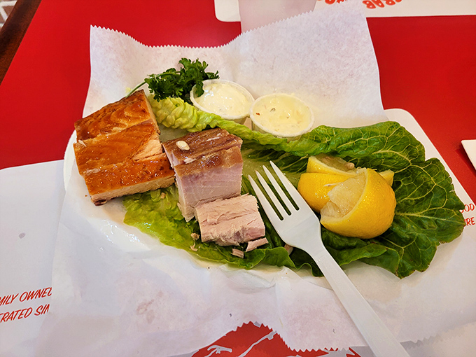 Smoked fish presented with the reverence it deserves&mdash;on a bed of greens with lemon wedges standing by for their supporting role.