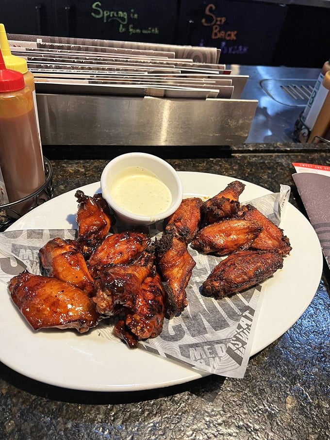 These wings didn't skip arm day&mdash;substantial, glistening with sauce, and demanding to be eaten with your hands, dignity be damned.