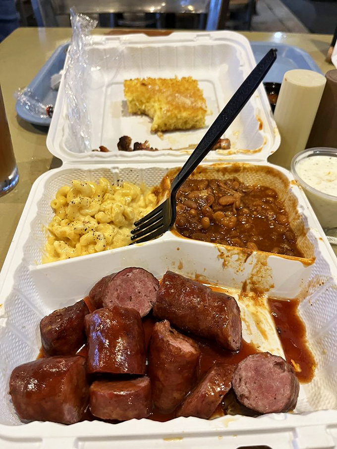 When smoked kielbasa joins forces with mac and cheese and baked beans, it's like the Avengers of comfort food assembled on one heroic plate.