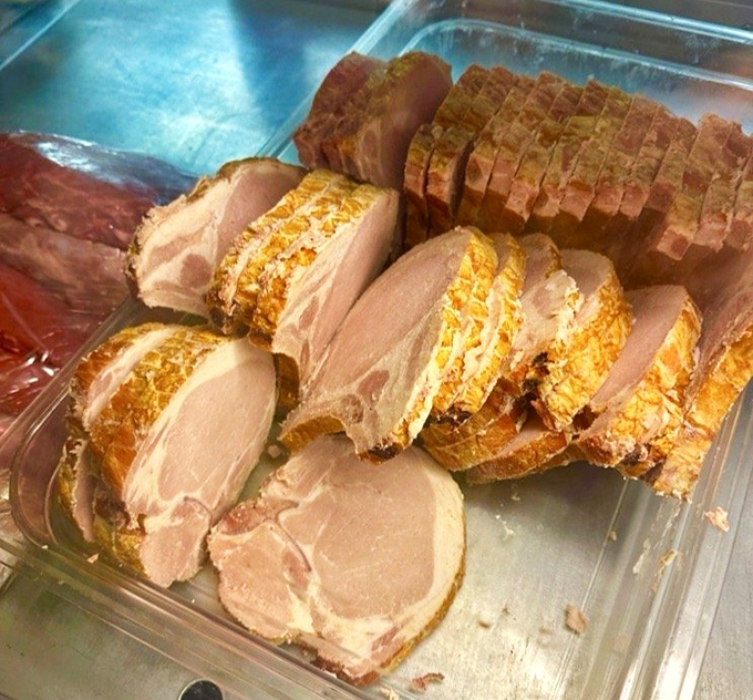 Smoked pork chops so perfectly pink they look like they're blushing from all the compliments they're about to receive. 