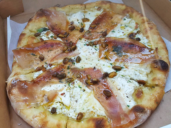 The Speck Pie: where Italian tradition meets creative genius in one glorious, photogenic circle.