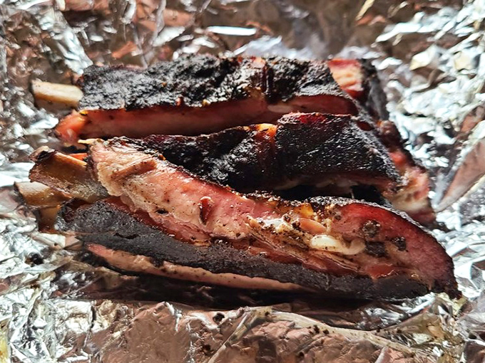 These ribs aren't "falling off the bone"&mdash;and that's exactly right. Perfect barbecue ribs should cling until your teeth say otherwise.