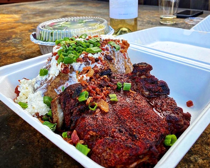 This isn't just dinner, it's edible art&mdash;spice-crusted meat resting on a bed of rice, with a drizzle of sauce that ties everything together like a culinary conductor.