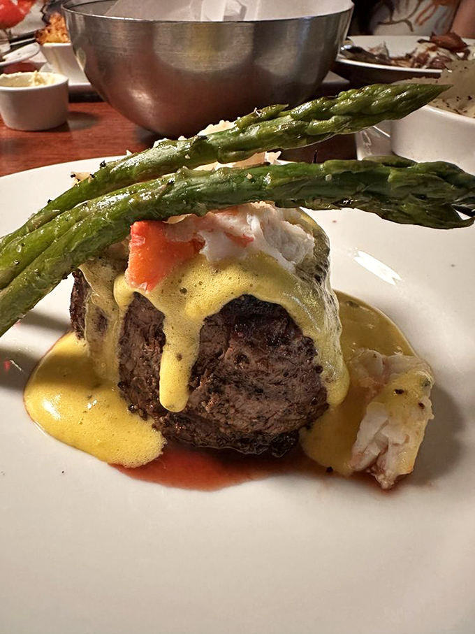 Steak Oscar &ndash; where beef meets asparagus meets seafood in a summit of flavors. That hollandaise is basically liquid sunshine.
