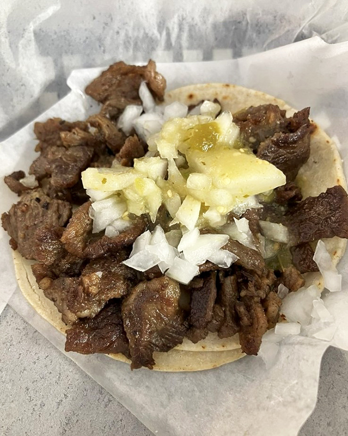 This steak taco doesn't need fancy plating when the meat speaks fluent deliciousness all by itself. 