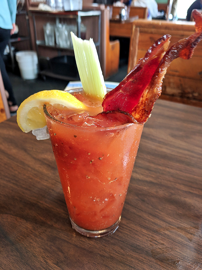 The Stove's Bloody Mary comes with its own breakfast&mdash;a strip of bacon that's both garnish and appetizer. Genius multitasking.