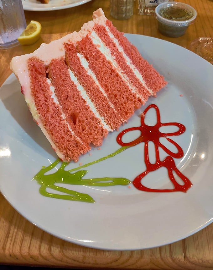 Strawberry cake layers that look like they escaped from a Norman Rockwell painting, pure Americana on a plate.