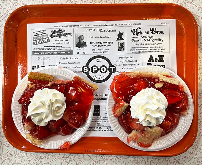 Twin slices of strawberry pie topped with clouds of whipped cream&mdash;proof that sometimes the best things in life come in pairs.