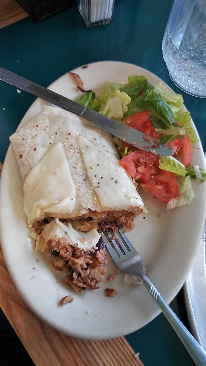 The stromboli that launched a thousand dreams &ndash; crispy outside, molten cheese paradise waiting within those golden walls.