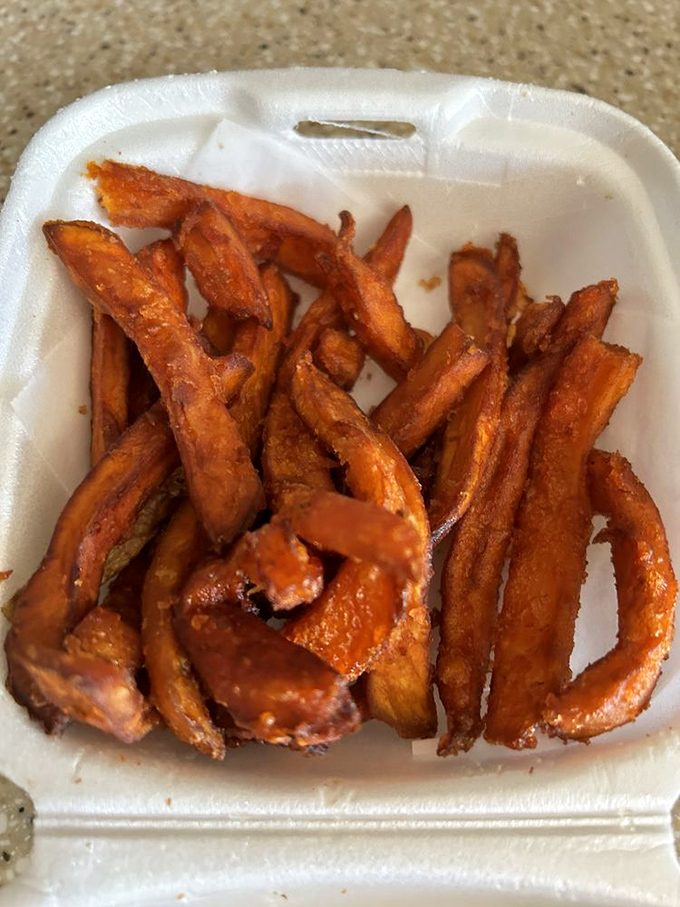Sweet potato fries &ndash; where healthy-adjacent meets indulgent. That caramelized exterior is nature's candy with a side of salt.