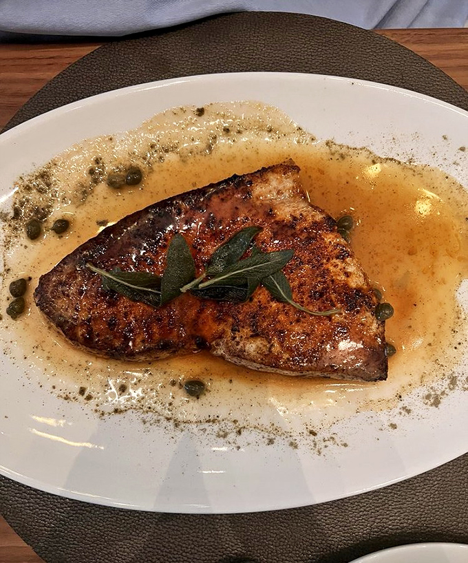 Swordfish that's been introduced to butter and capers in a meeting so successful, it deserves its own LinkedIn recommendation.