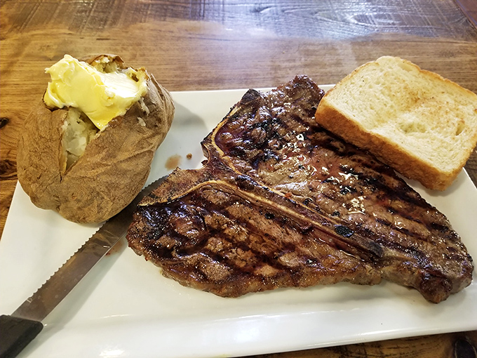 This T-bone isn't just a steak; it's a work of art with grill marks that tell stories of flame and smoke worthy of a Texas campfire legend.