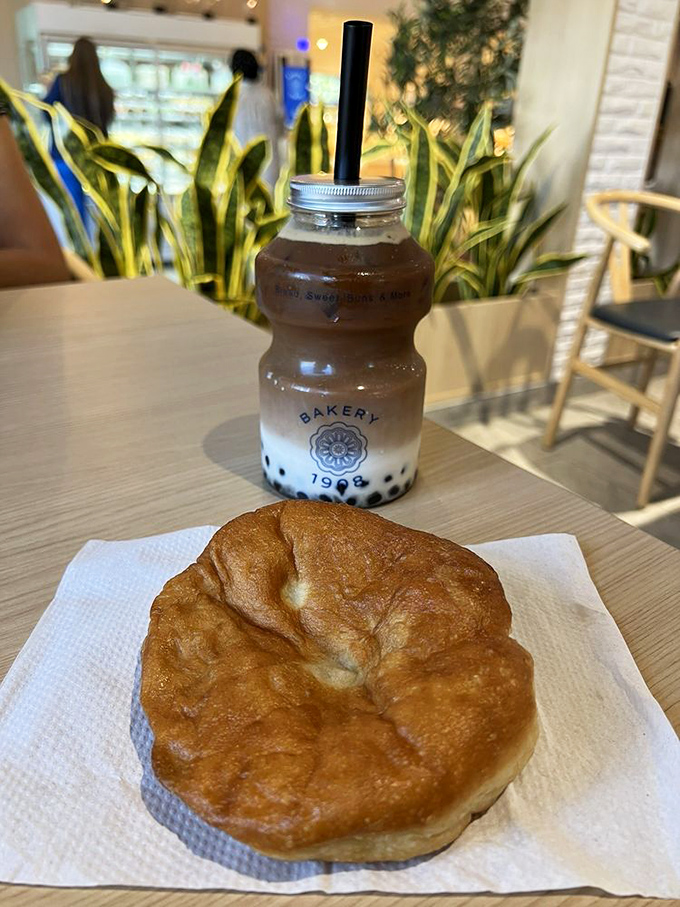 This taro donut and boba milk tea combo is the dynamic duo your afternoon desperately needs. Purple never tasted so perfect.
