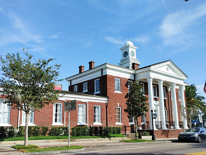 The stately brick Cultural Center stands as an architectural anchor in Tarpon Springs, blending classical columns with Florida palms in perfect harmony.