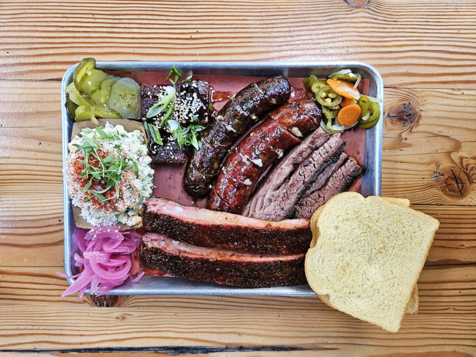 A meat mosaic of perfection. Pickled onions and cucumber slices offer bright respite between bites of smoked magnificence.