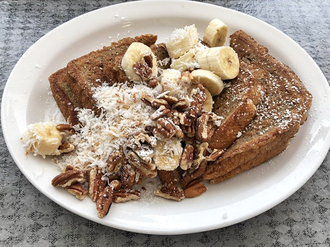 French toast that went on vacation and came back more interesting. Bananas, pecans, and coconut transform breakfast into an island celebration worth waking up for.