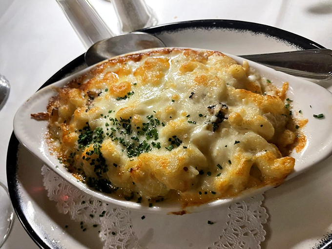 This isn't just mac and cheese &ndash; it's a bubbling cauldron of comfort where several cheeses have gathered for the world's most delicious reunion.