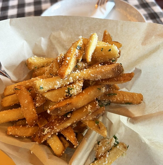 These aren't just fries&mdash;they're potato aristocracy, dressed in their finest cheese attire and perfumed with truffle oil for their grand appearance at your table.