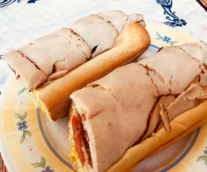 Thinly sliced turkey stacked high with all the fixings &ndash; proof that sometimes the classics remain undefeated for good reason.